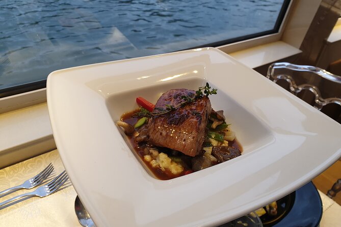 Paris Prestige Dinner Cruise From Eiffel Tower Area - Exploring the Seine River at Night