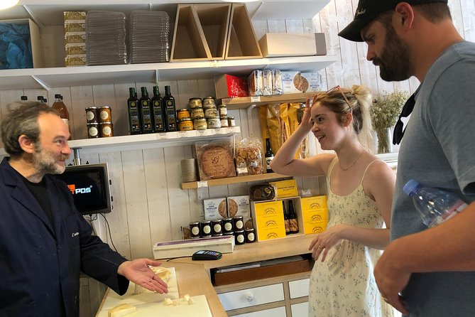 Paris South Montmartre Gourmet French Flavors Tasting Food Tour - Visiting Notable Attractions