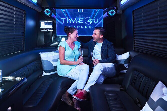 Party Bus Excursion Disco Ball, Limo Seating, Bar, & LED Lights - The Sum Up