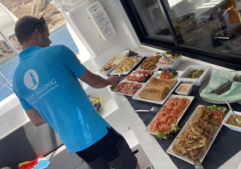 Pasito Blanco: Private catamaran excursion with food & drink - Learning to Sail and Personalized Service