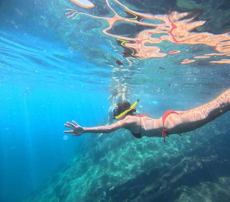 Phi Phi: Pirate Boat with Snorkeling, Kayaking, and Sunset - Key Points