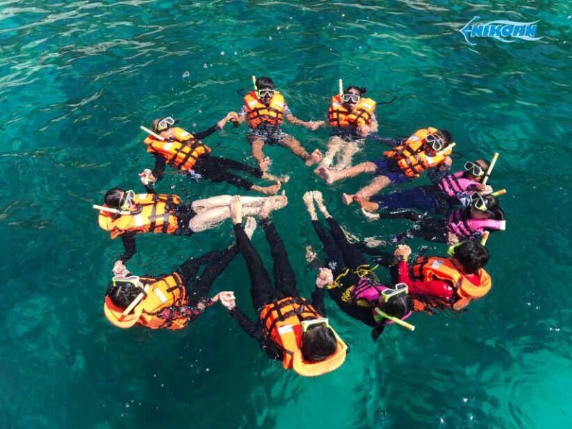 Phuket: Coral Island Day Trip and Sunset Dinner by Catamaran - The Experience: Authentic Moments Amidst Tour Group Comfort