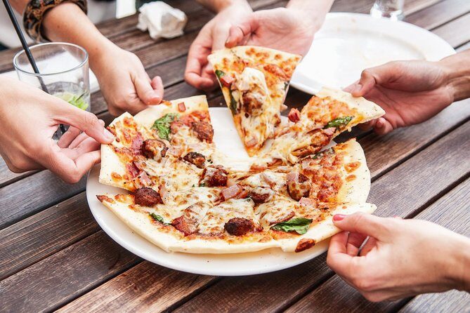 Pizza Walking Tour in Manhattan with Friendly Local Guide - Exploring NYC’s Neighborhoods through Pizza