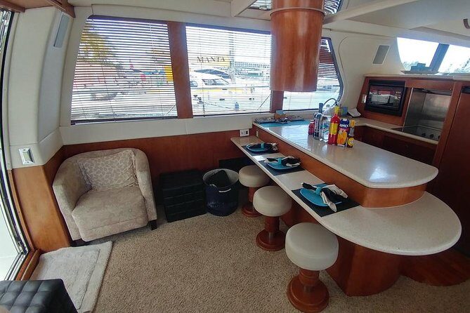 Playa Mujeres rent a Yacht 4hrs with Food and drinks aboard CA55 - Practical Details: Group Size, Duration, and Pricing
