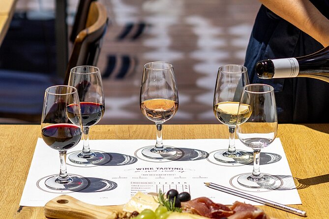 Porto Wine Tasting Experience With Portuguese Tapas Plate - Key Points