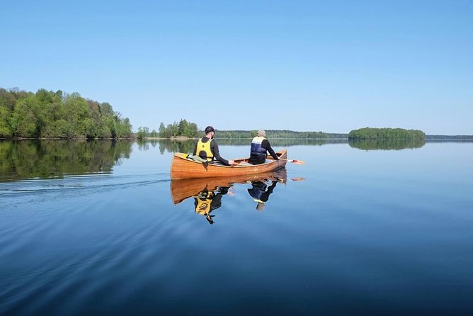 Premium guided Canoe Tour in lake Plateliai Handcrafted inventory and picnic set - Practical Details and Considerations