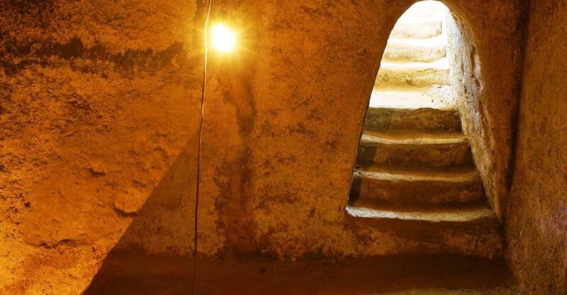 Private 6-Hour Cu Chi Ben Dinh Tunnels Tour - Entering the Cu Chi Tunnels