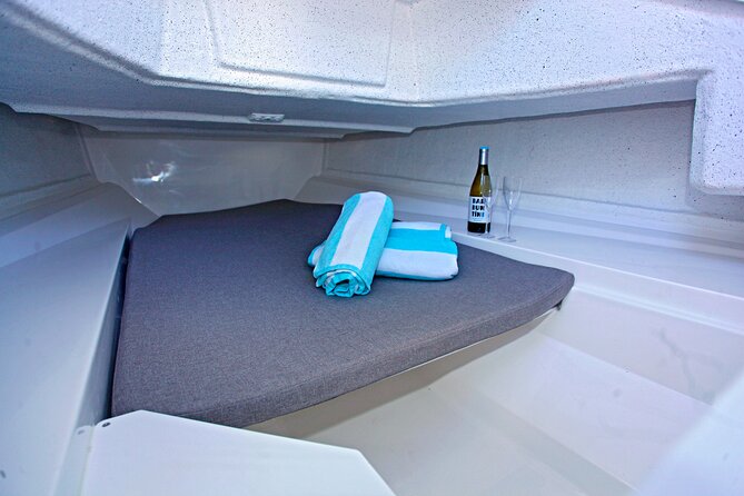 Private Boat Rental Abaris 23 From Alcudia - Included Amenities and Life Jackets