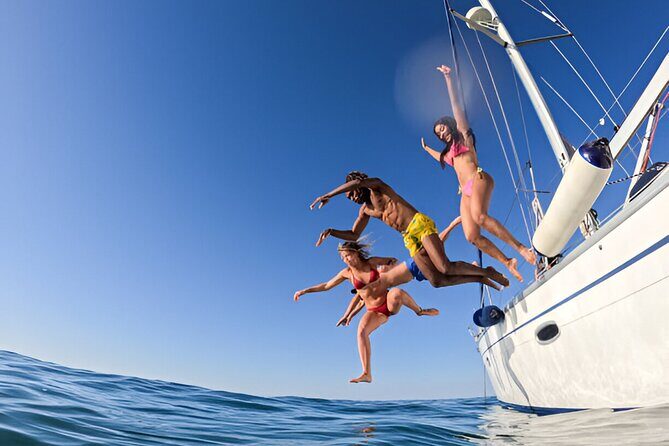 Private catamaran for groups up to 15 people and Lunch on board - The Sum Up
