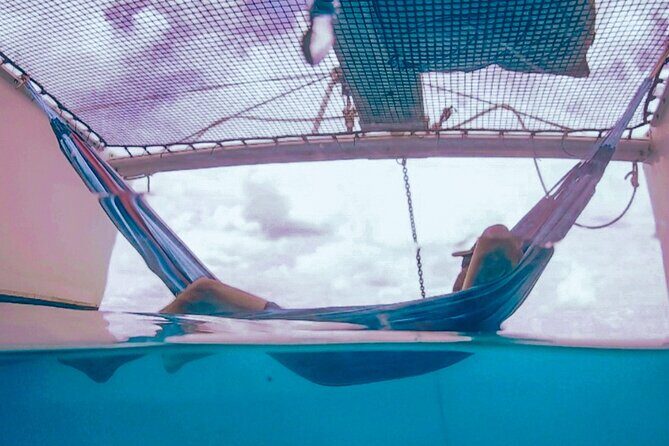 Private Catamaran Swim sail snorkel cliff jumping SUP - Key Points