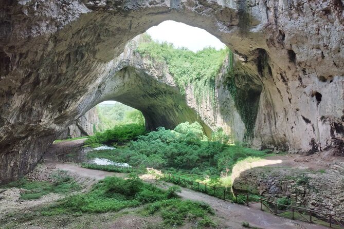 Private Day Trip to Krushuna Waterfalls and Devetashka Cave - Visiting Devetashka Cave