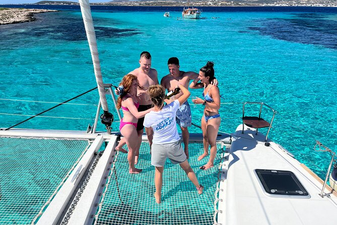 Private Full Day Catamaran Cruise From Paros With Lunch - Key Points