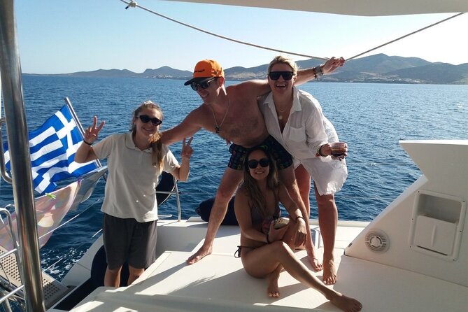 Private Full Day Catamaran Cruise From Paros With Lunch - Onboard Amenities and Activities