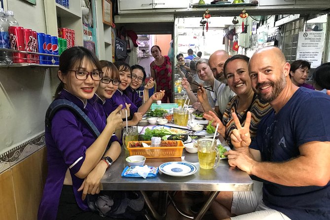 Private Ho Chi Minh Street Food Tour by Motorbike with Ao Dai Female Rider - Key Points