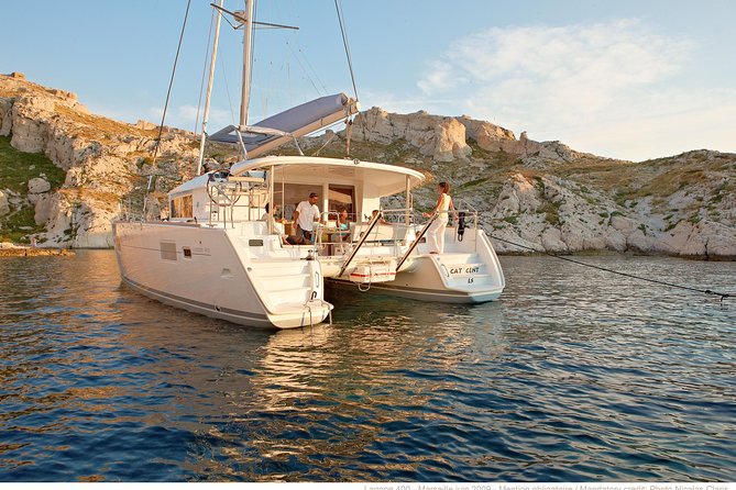 Private Morning Tour Lagoon 400-380 Sailing in Santorini ,Lunch, Drink, Transfer - Inclusions