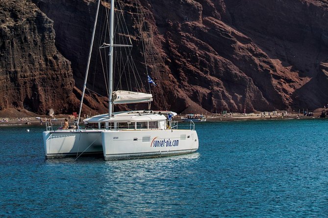 Private Morning Tour Lagoon 400-380 Sailing in Santorini ,Lunch, Drink, Transfer - Highlights and Unique Features