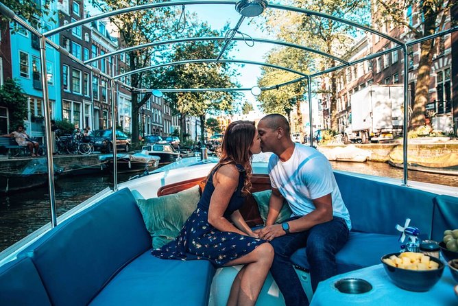Private Romantic Canal Cruise Amsterdam With Bubbly and Snacks - Intimate and Personalized Tour