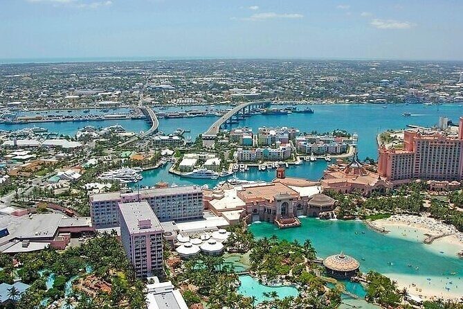 Private Roundtrip Sedan Airport Transfer to Paradise Island - Key Points