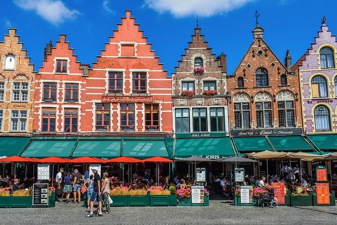 Private sightseeing roundtrip transfer to Bruges from Amsterdam - Key Points