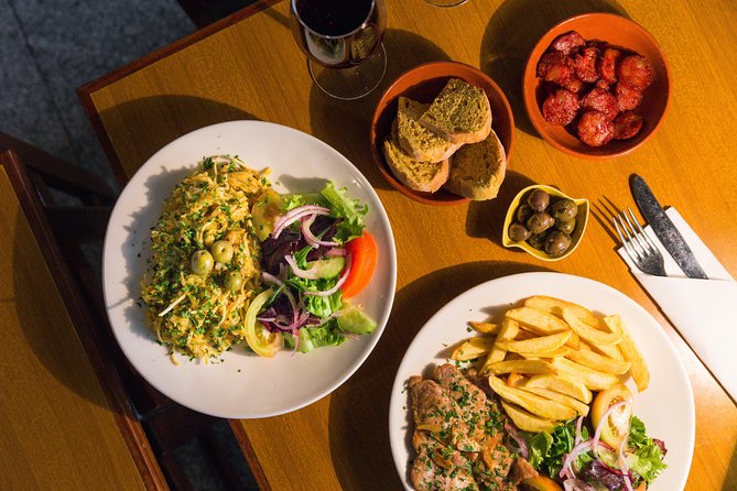 Private Tour: Lisbon Sunset Walking Tour With Fado Show and Dinner - Taking in the Cultural Richness of Alfama