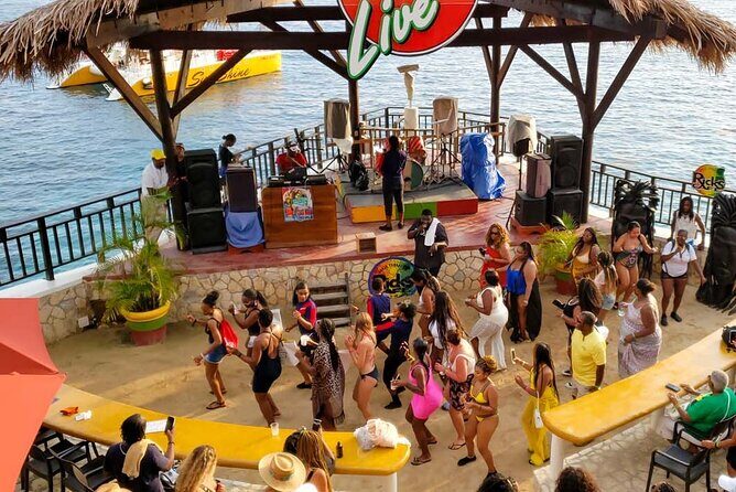 Private Tour to 7 Mile Beach Ricks Cafe with ATV from Montego Bay - Overview of the Experience