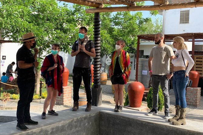 Private Tour to the Astonished Nazca Lines and Huacachina Oasis - Indulging in Peruvian Flavors at a Local Vineyard