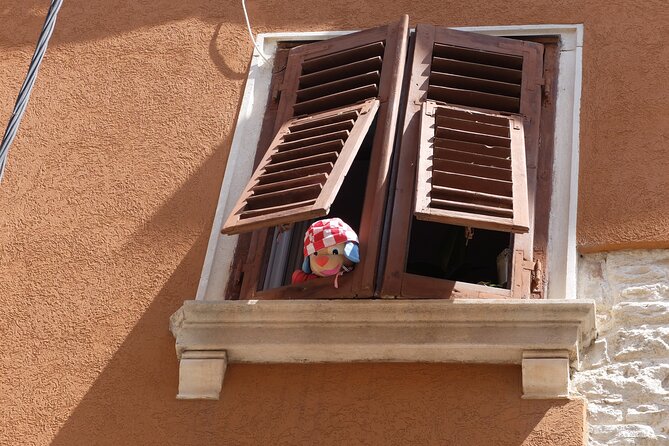 Pula City Tour in German - Discovering Pulas Rich History