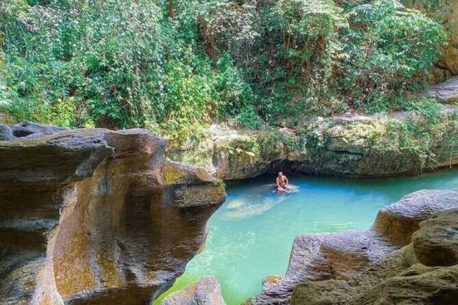 Rainforest Caves and Waterfalls Exploration with Transportation - Key Points