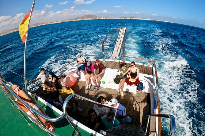 Return Ferry to Lobos Island From Corralejo, Fuerteventura - Relaxing on La Concha Beach