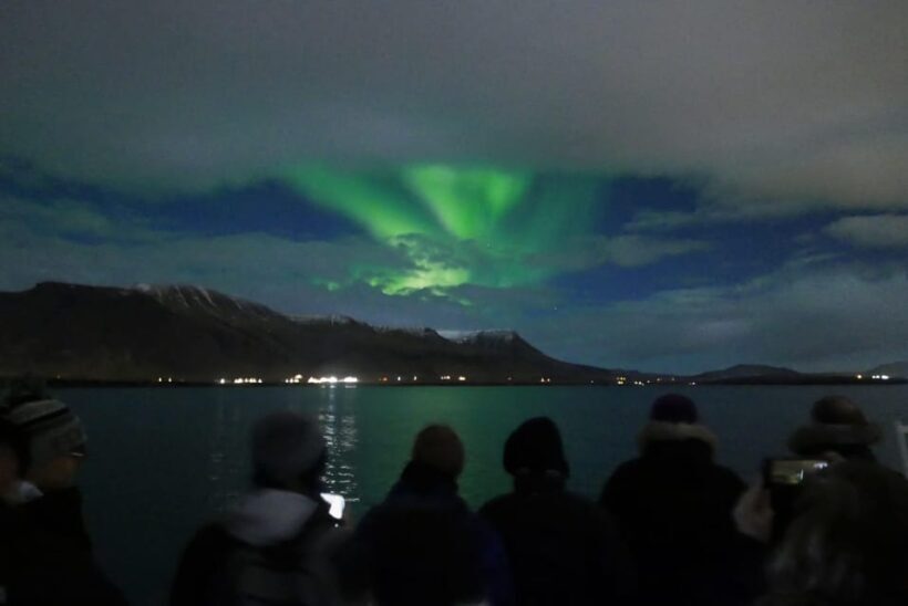Reykjavik: Northern Lights Guided Boat Tour with Photos - Weather, Cancellations, and Practical Tips