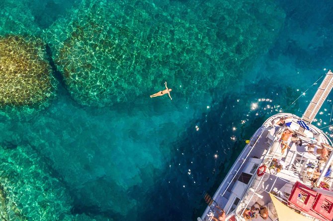 Rhodes Exclusive Swim Cruise with Greek Gourmet Buffet & Drinks - Authenticity and Experience