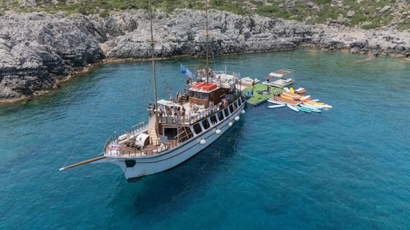 Rhodes: Gulet Trip with Food, Drinks, SUP, Kayak & Swimming - The Sum Up