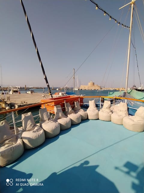 Rhodes: Sunset Cruise to Kallithea with Drinks and Snacks - Authenticity and Atmosphere