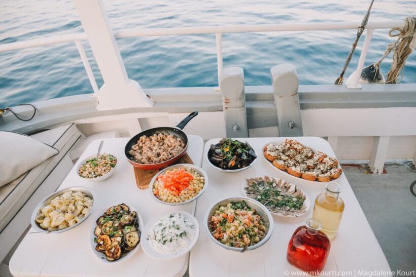 Rhodes: Sunset Cruise with Live Music, Wine & Greek Buffet - Entertainment & Atmosphere: Live Music and a Relaxed Vibe