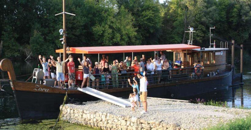 Riverboat tour by replica of a traditional itna laa boat - An In-Depth Look at the Kupa Riverboat Experience