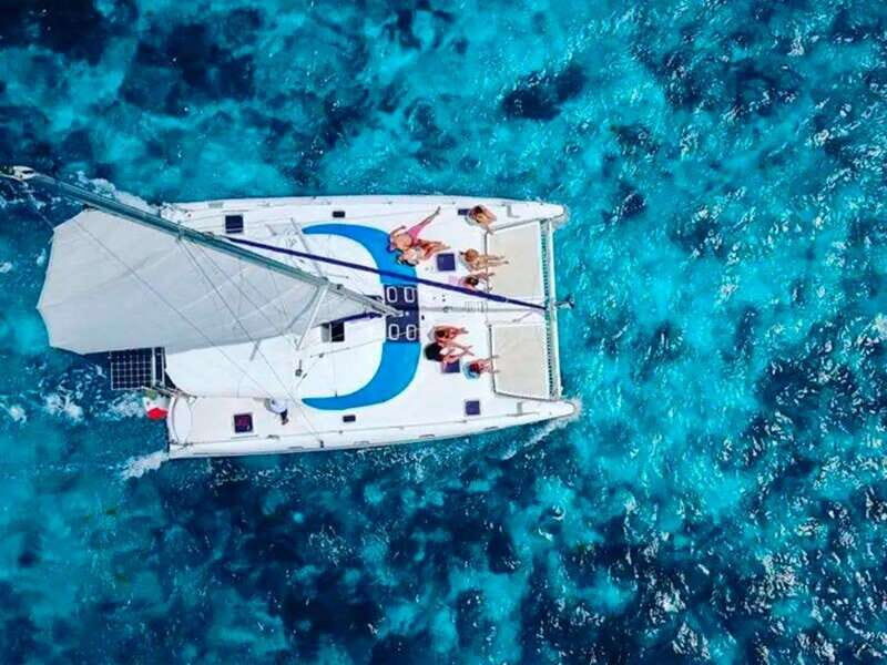 Riviera Maya: Full Day Private Catamaran to Isla Mujeres - The Return Journey and Optional Activities