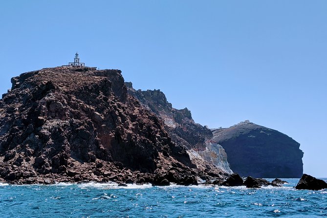 Roam the Caldera With a Private Motor Yacht - Visiting the Venetian Lighthouse and Indian Rocks
