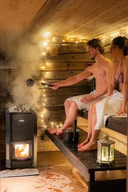 Rovaniemi: Private Sauna and Ice Swimming Tour with Snacks - Key Points