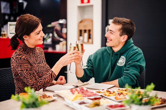 Sagrada Familia Jamon & Tapas Tasting Experience - Overview of the Sagrada Familia Jamon & Tapas Tasting Experience