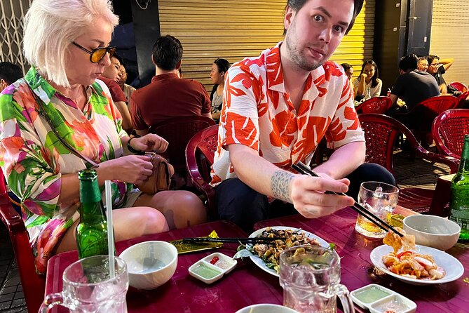 Saigon Street Food By Night - Foodie City Private Tour With Local Guide - The Intangible Experience: Sight, Sound, and Sizzle