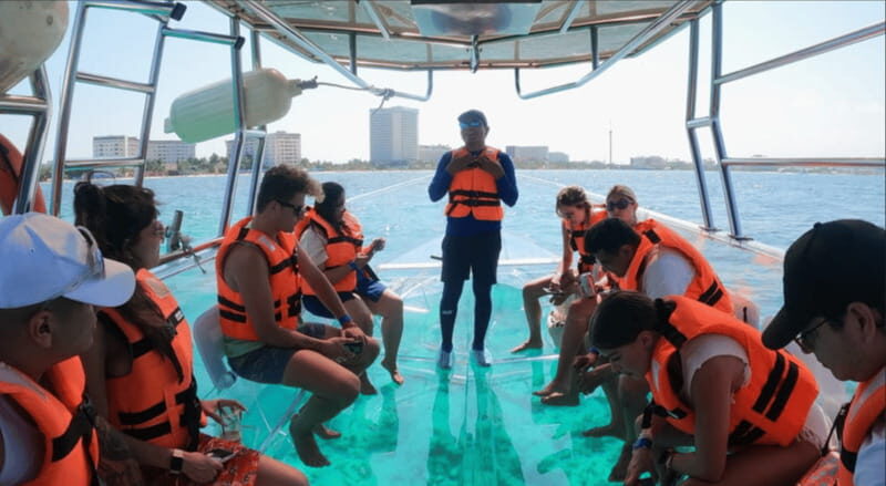 Sail around cancun in the best transparent boat + 2 drinks - The Value This Tour Offers