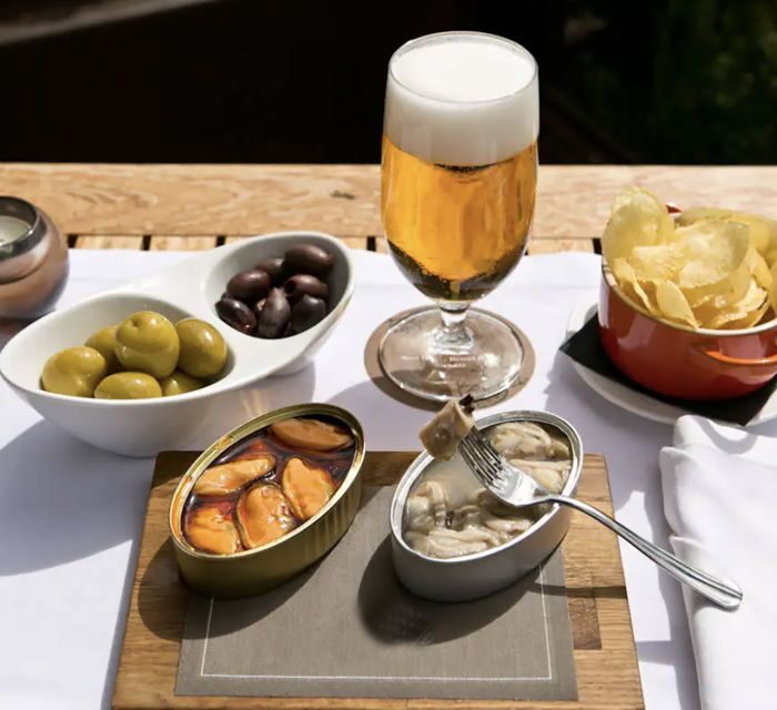 sailing sunset with special aperitif - The Sum Up