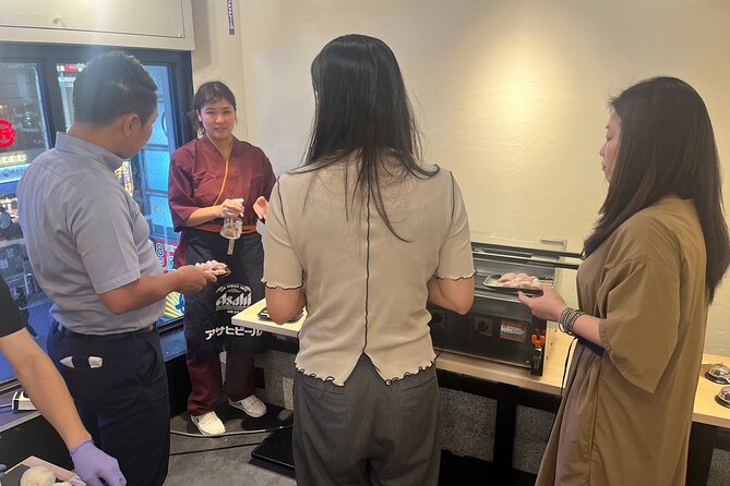 Sake Tasting and Yakitori & Onigiri Making Experience - Inclusions