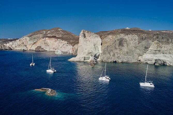 Santorini: Caldera Luxury Catamaran Cruise With Meal & Drinks - Indulging in a Delectable Greek Feast