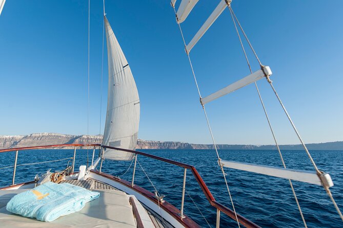 Santorini Caldera Sunset Traditional Cruise With Meal and Drinks - Transportation and Accessibility