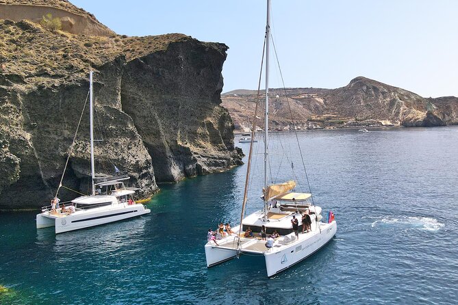 Santorini Catamaran Day Cruise: Lunch, BBQ, Open Bar, Transfers - Santorinis Stunning Scenery