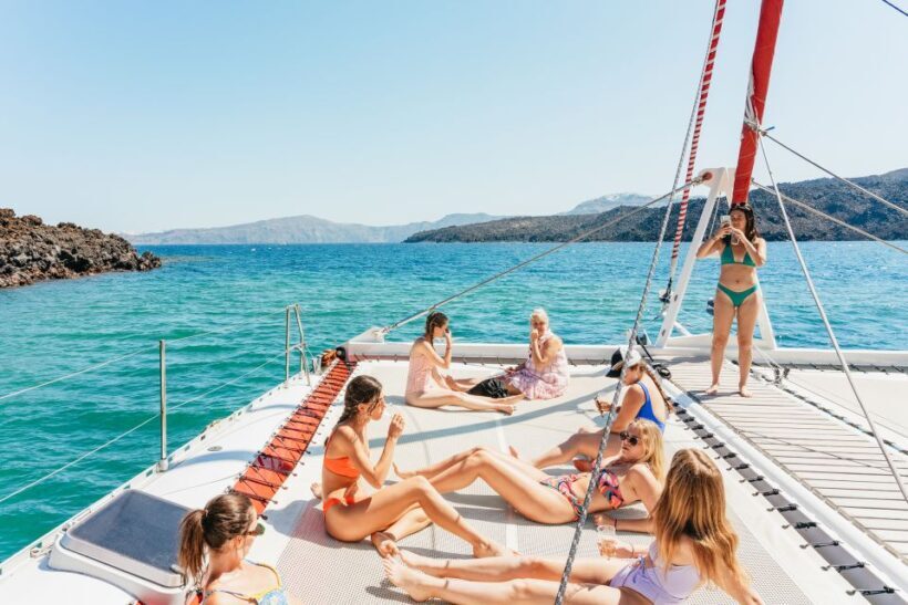 Santorini: Catamaran Tour with BBQ Dinner, Drinks, and Music - The Sum Up