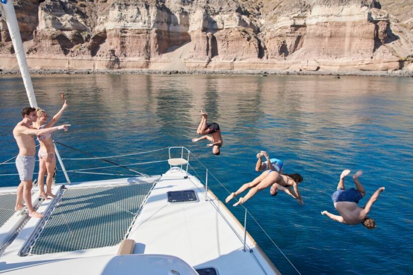 Santorini Gold Catamaran Cruise with Snorkel, BBQ & Open Bar - An Authentic Taste of Santorini’s Coastline