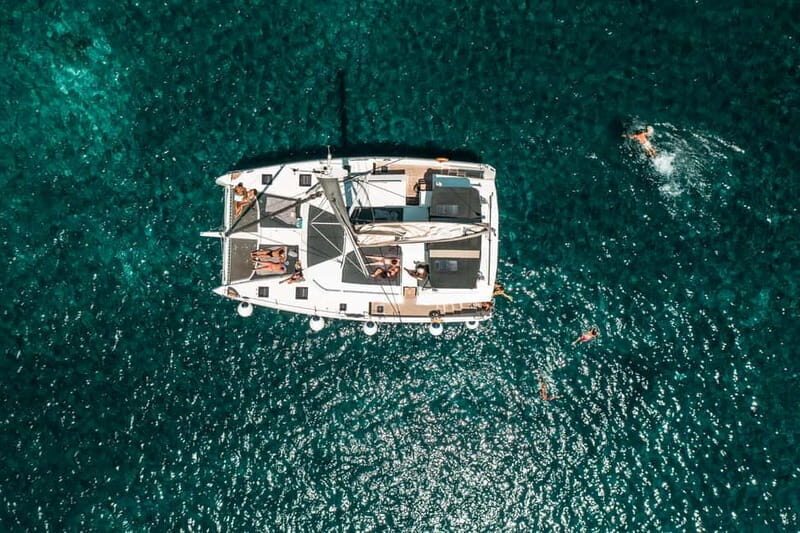 Santorini: Majestic Catamaran Cruise with Meal and Drinks - Key Points