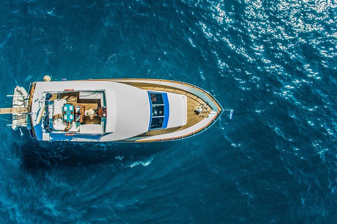 Santorini: Motor Yacht Sunset Cruise With 5-Course Dinner - Pickup and Transportation